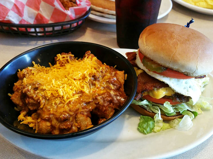 Waffle-cut fries and a sandwich that's stacked higher than my hopes for dessert&mdash;and that's saying something.