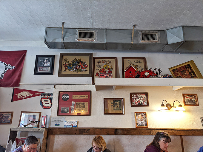 The walls aren't just decorated&mdash;they're curated with Razorback pride. In Arkansas, team loyalty isn't optional; it's practically on the birth certificate.