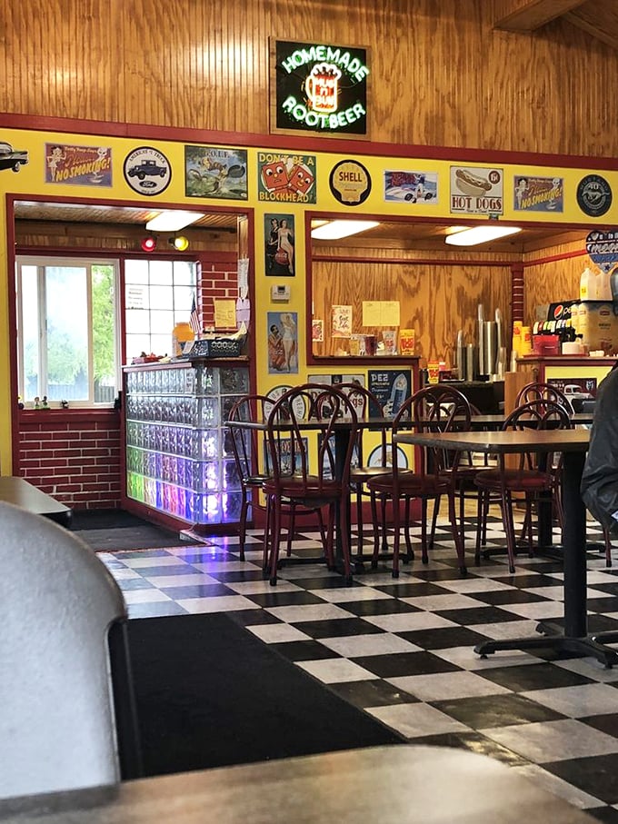 The dining room feels like stepping into a time capsule, complete with neon sign announcing the homemade root beer's presence.