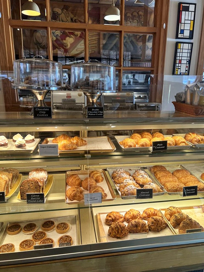 The pastry case at Corner Cafe is essentially an adult candy store where "just looking" becomes an exercise in magnificent self-deception.