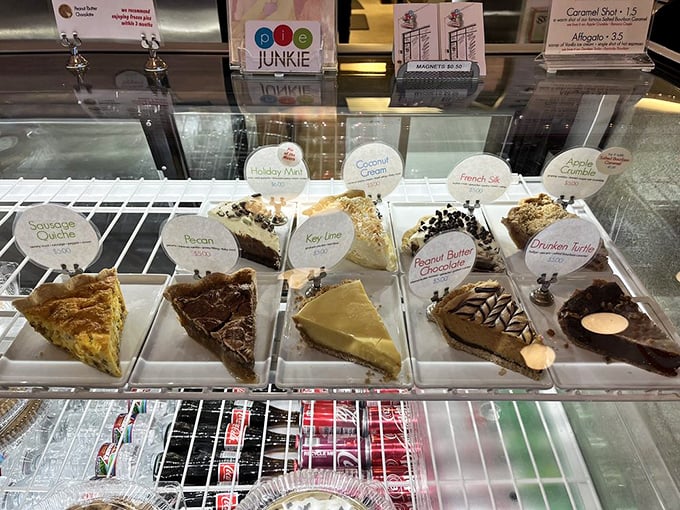 The display case of dreams where calories don't count and decisions are impossible. Each slice is auditioning for your affection.