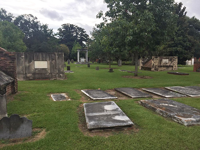 The juxtaposition of crumbling tombs against vibrant greenery creates a hauntingly beautiful tableau that photographers can't resist capturing.