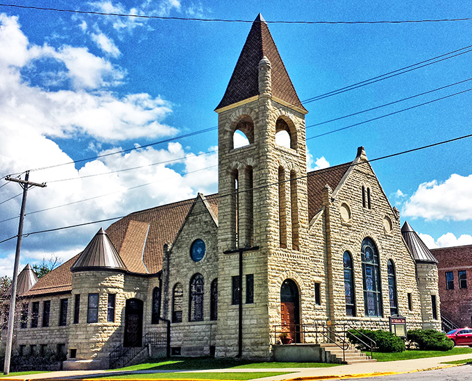 First Congregational Church stands as a limestone testament to faith, community, and spectacular architecture. Those stained glass windows have seen generations of Eldorans.