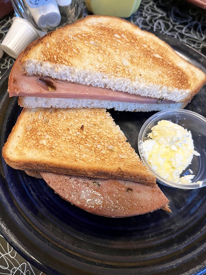 Perfectly toasted bread, ham that knows its purpose in life, and a side of butter. Sometimes simplicity is the ultimate sophistication.