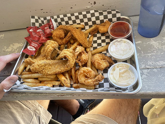 Fried seafood platter that answers the eternal question: "Why choose between catfish and shrimp when you can have both?" Checkmate, indecision.