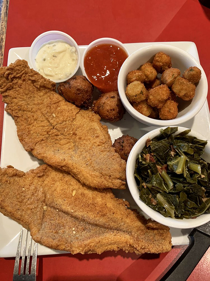 This isn't just fried catfish&mdash;it's a masterclass in Southern cooking with collard greens and hush puppies playing perfect supporting roles.