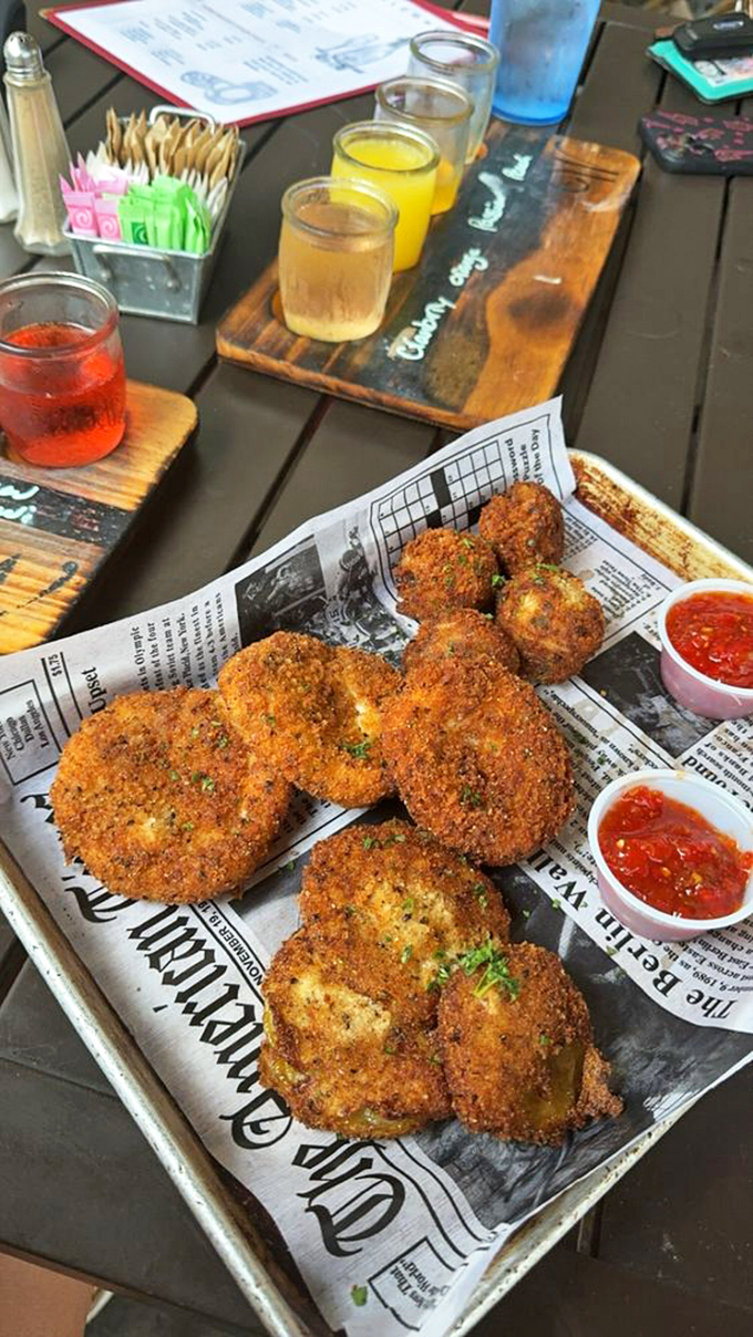 Newspaper isn't just for reading anymore. These golden-fried green tomatoes demand to be photographed before they're devoured.