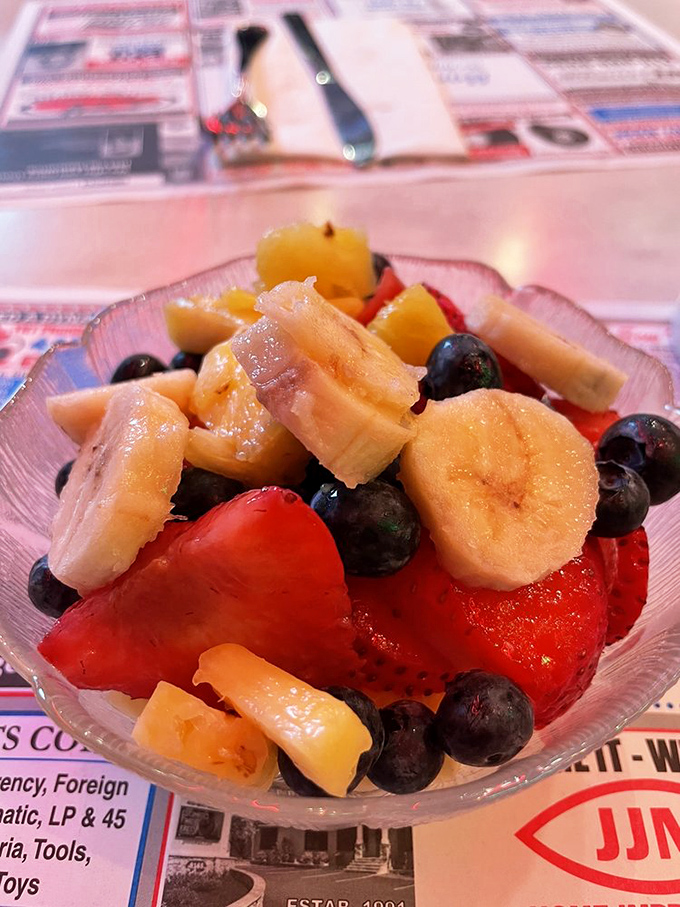 A fresh fruit cup that brings color and virtue to the table – nature's way of saying "balance that bacon with something that grew on a plant."