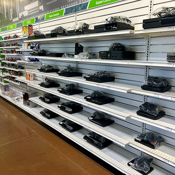 Gaming nostalgia lines these shelves, where yesterday's cutting-edge consoles await their second act in a new home.