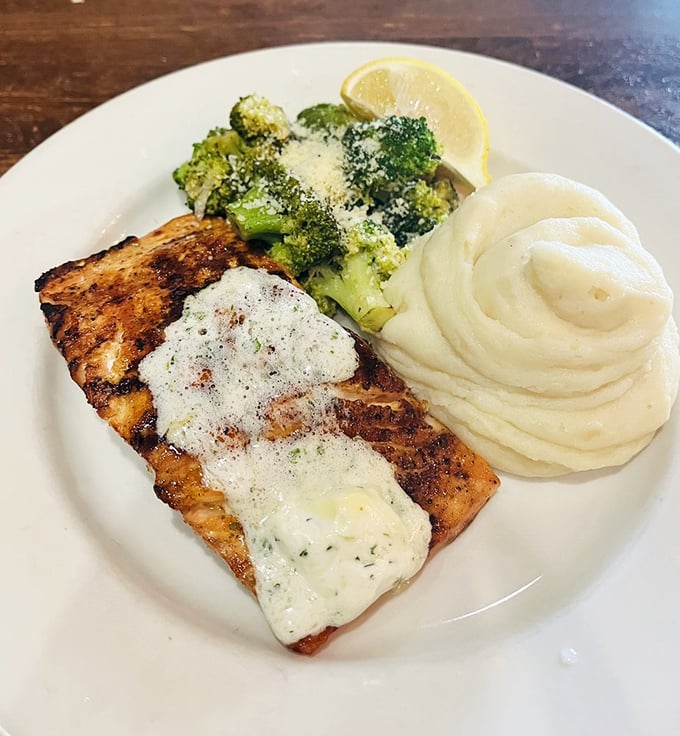 Salmon that's actually grilled properly&mdash;crisp exterior, moist interior&mdash;paired with broccoli to convince yourself this meal has nutritional value.