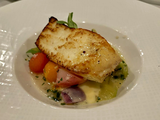 This perfectly seared halibut resting on a rainbow of vegetables isn't just dinner&mdash;it's edible artwork with Chesapeake soul.