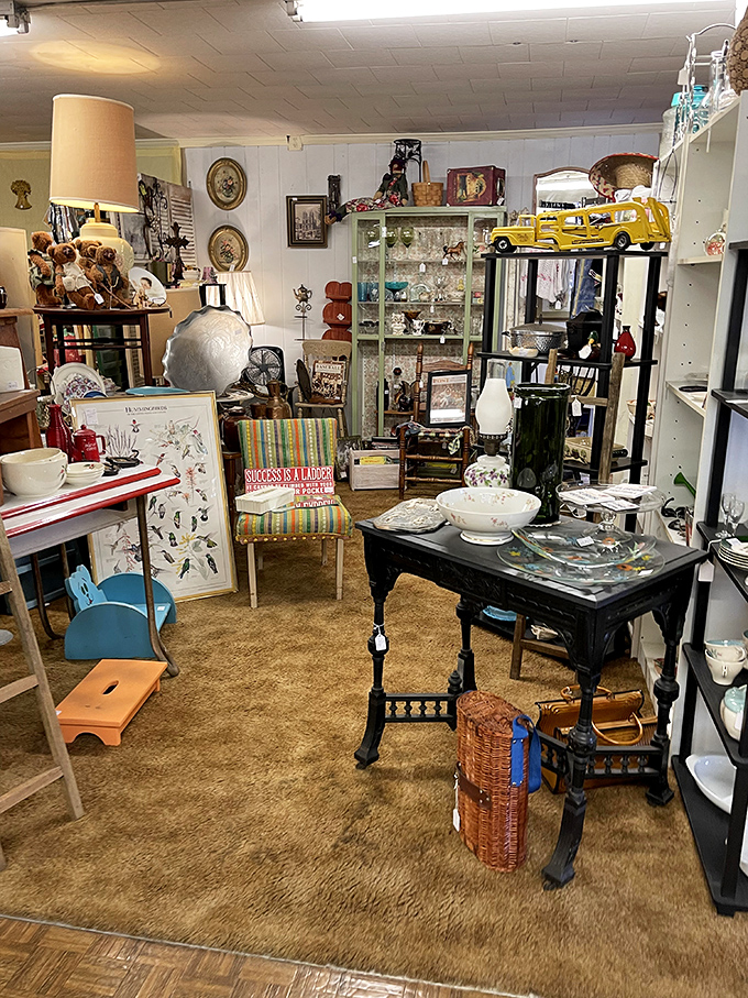 Mid-century meets Victorian in this elegant booth. That striped chair has probably heard more family secrets than a therapist.