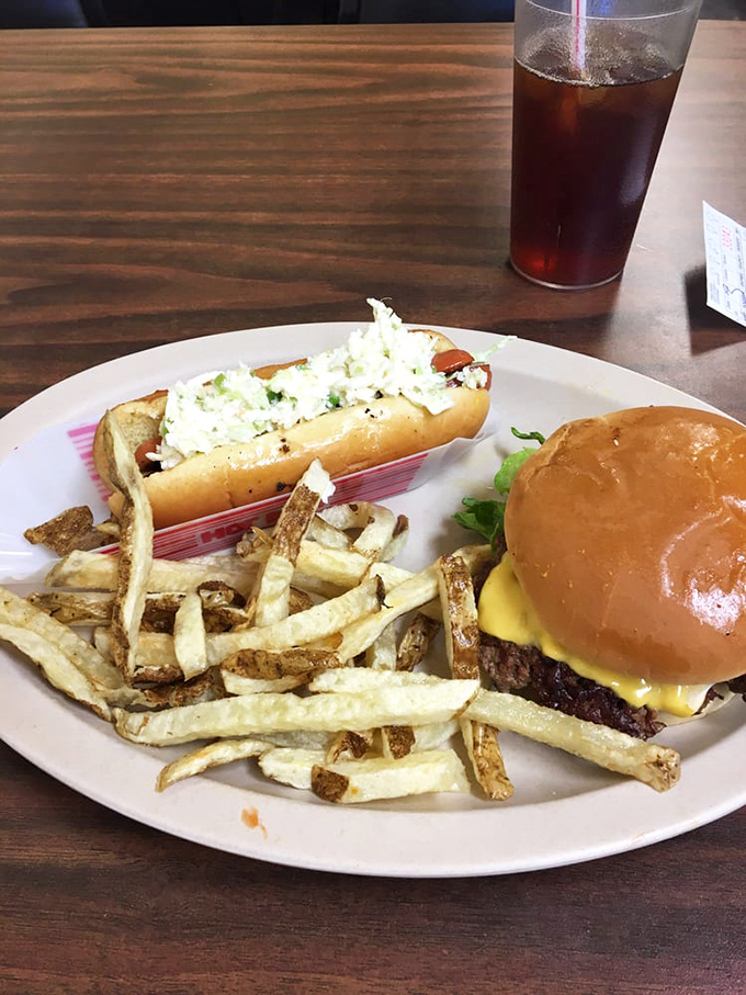 That hot dog isn't just playing second fiddle to the burger&mdash;it's starring in its own delicious production with a supporting cast of hand-cut fries.