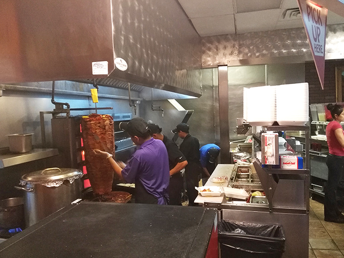 Where the magic happens: that vertical spit of al pastor is the beating heart of Los Guachos, slowly rotating its way into Columbus legend.