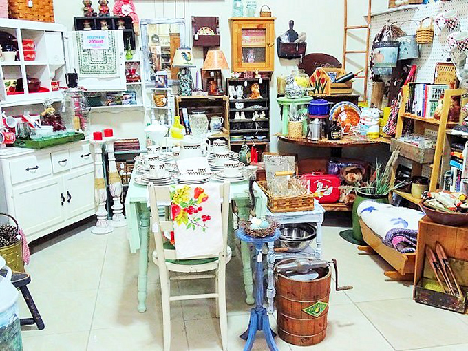A kitchen vignette that's part farmhouse fantasy, part time machine. That mint-green table has hosted more family stories than Facebook ever will.