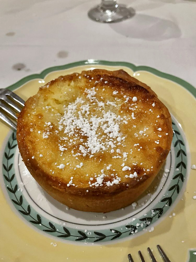 This lemon tart isn't just dessert&mdash;it's sunshine captured in pastry form, dusted with powdered sugar snow.