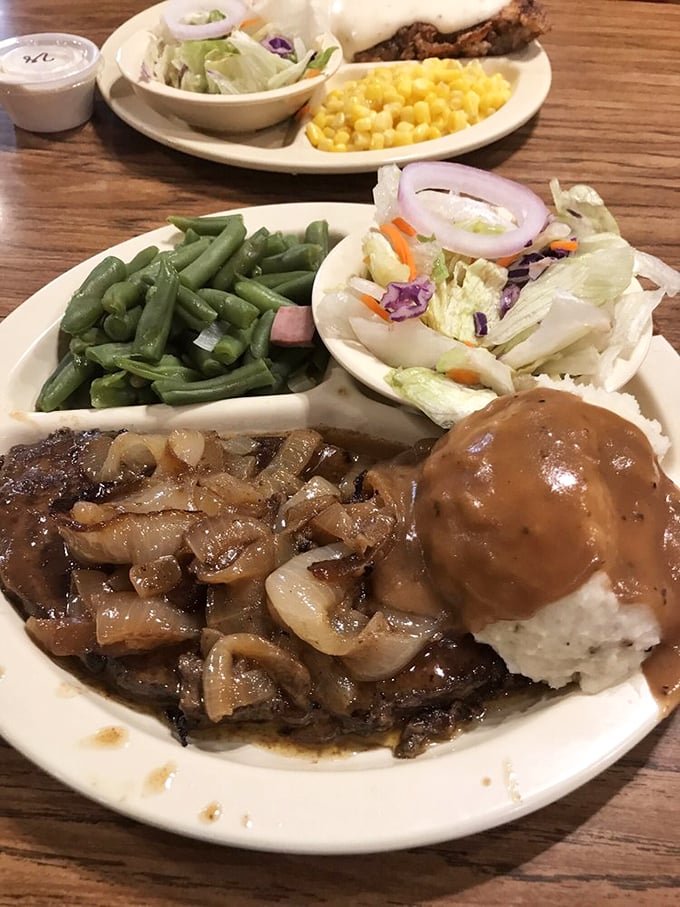 Liver and onions with mashed potatoes swimming in gravy&mdash;a dish that separates the true comfort food connoisseurs from the pretenders