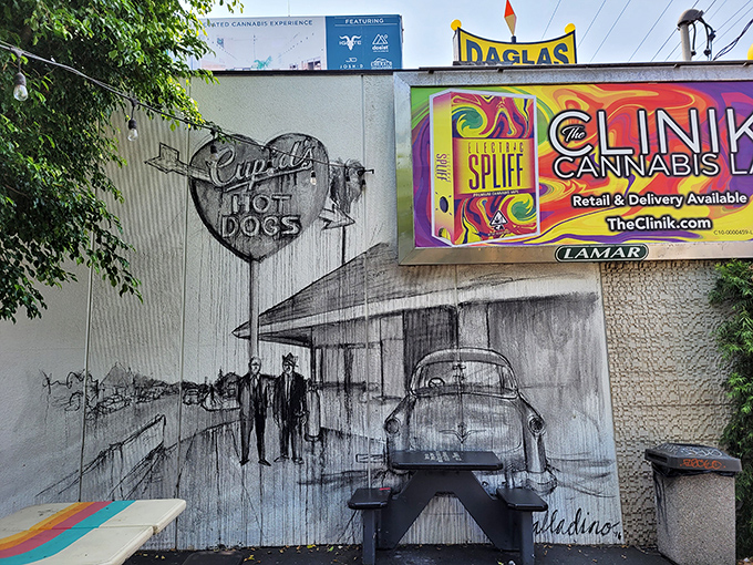 A mural celebrating Cupid's storied past adorns the patio wall. Hot dog history painted large &ndash; a reminder that some legends never fade.