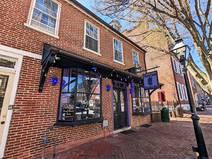 Nora Lee's brick facade and string lights promise the kind of neighborhood cafe where locals debate whether the coffee or the gossip is stronger.