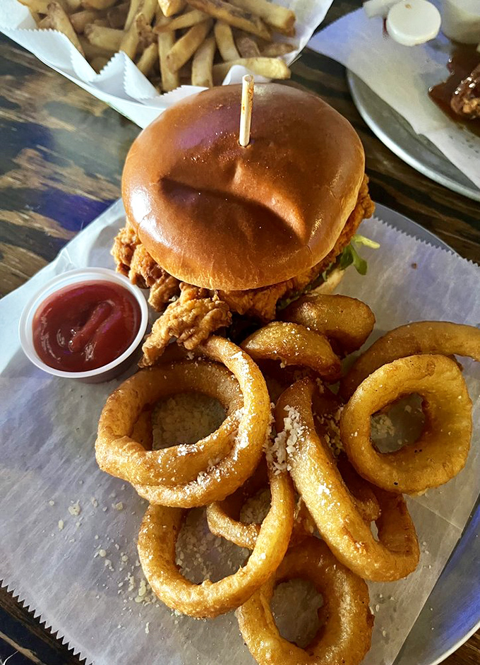 Golden onion rings and a perfectly stacked burger&mdash;the kind of plate that makes nearby diners point and say, "I'll have what they're having."