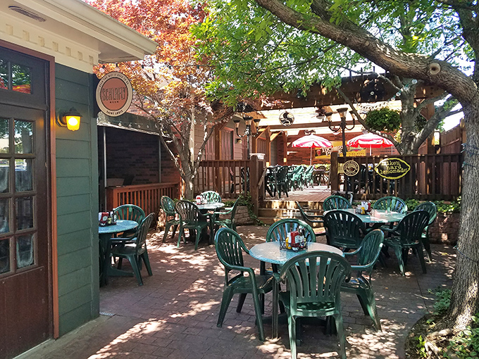 When Missouri weather cooperates, this charming outdoor patio offers dappled shade and fresh air &ndash; nature's perfect seasoning for any meal.