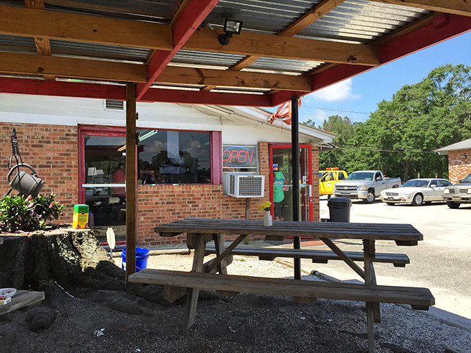 Al fresco dining, Laurel Hill style &ndash; picnic tables under a simple awning create the perfect stage for summer memories.