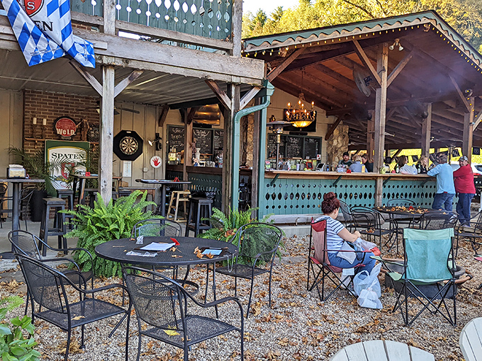 The outdoor seating area, where mountain breezes enhance every bite and strangers become friends over shared discoveries of sandwich excellence.
