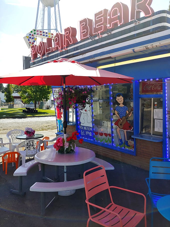 Colorful chairs, cheerful umbrellas, and the promise of ice cream make this patio the happiest spot in Merrill.