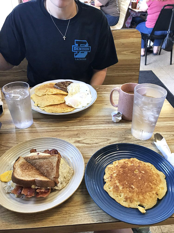 A table that tells the story of breakfast democracy&mdash;everyone gets exactly what they want, from classic egg sandwiches to pancakes with the perfect golden hue.