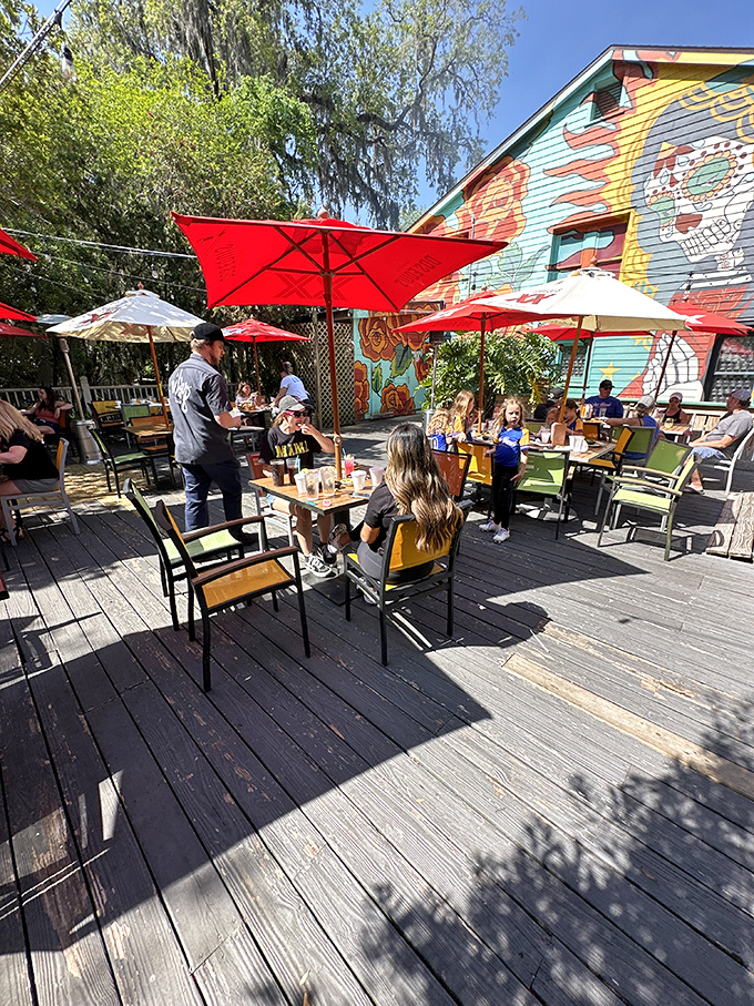 Outdoor dining under red umbrellas&mdash;where Florida sunshine and taco cravings meet in perfect harmony. Al fresco perfection!