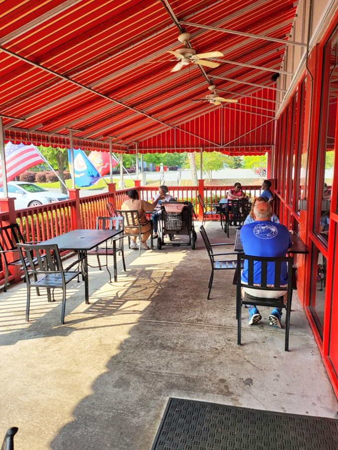 Al fresco pancake consumption under Savannah's famous red awning. Even the ceiling fans seem to be spinning with anticipation.