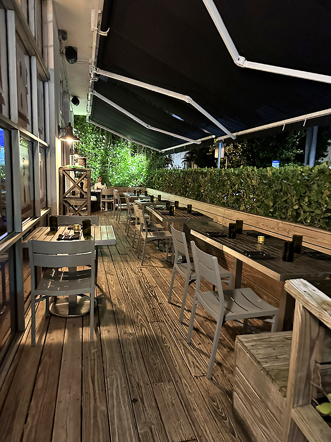 Evening dining al fresco with a side of Miami night air. This wooden deck feels like the best back porch in the South.