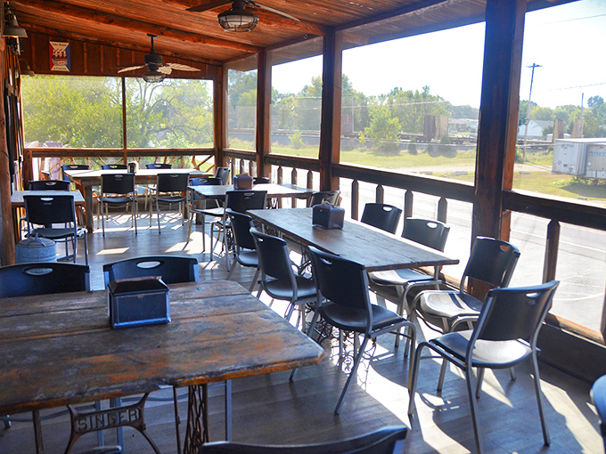 The screened porch offers al fresco dining without the flies—because nothing should come between you and barbecue communion.