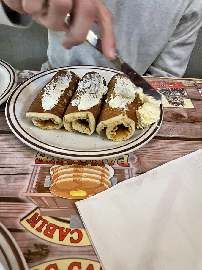 Rolled pancakes with cream cheese that look like they're ready for their Food Network close-up. Breakfast gets fancy.