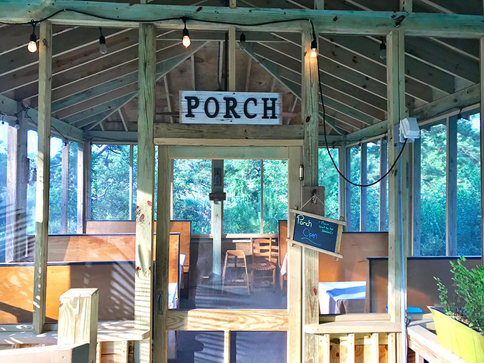 The screened "PORCH" &ndash; possibly the most coveted seats in the house, where ocean breezes enhance every bite.