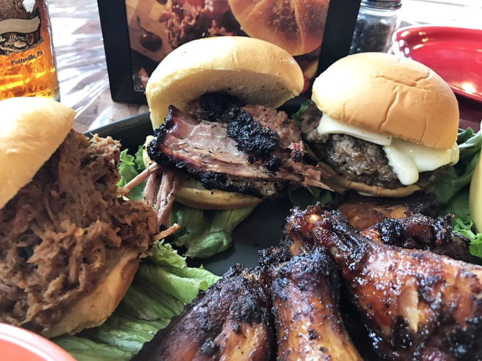 A trio of sandwiches that showcase the holy trinity of barbecue&mdash;pulled pork, brisket, and ribs&mdash;all demanding equal attention.