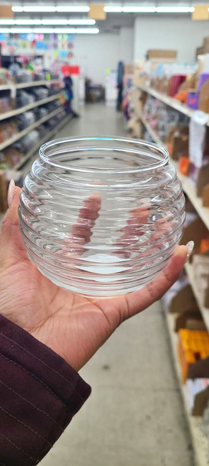 A perfectly rippled glass bowl catches the light and imagination. In fancy stores, this would be "artisanal"&mdash;here, it's just Tuesday's great find.