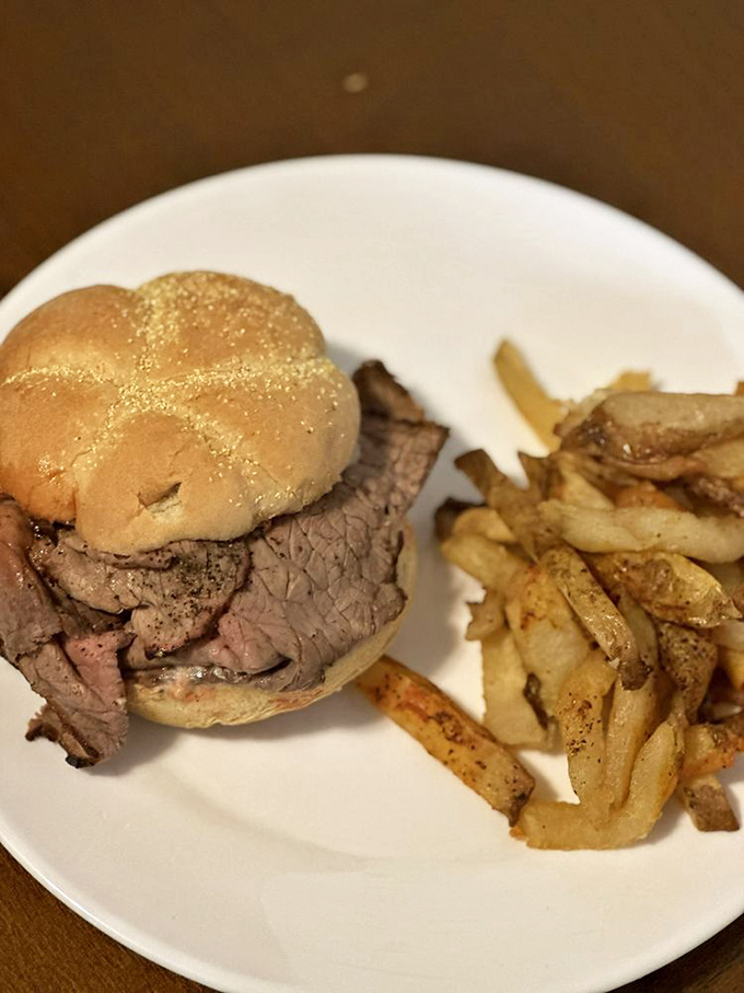 The perfect plate doesn't exi— Wait, it does! A kaiser roll embracing thin-sliced beef beside golden fries is Baltimore's answer to heaven.