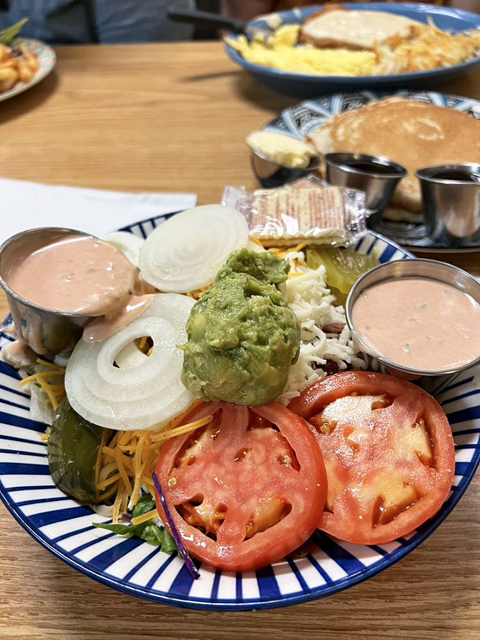 A salad that doesn't apologize for being a salad &ndash; fresh ingredients arranged with care, proving vegetables can be the main event, not just the opening act.