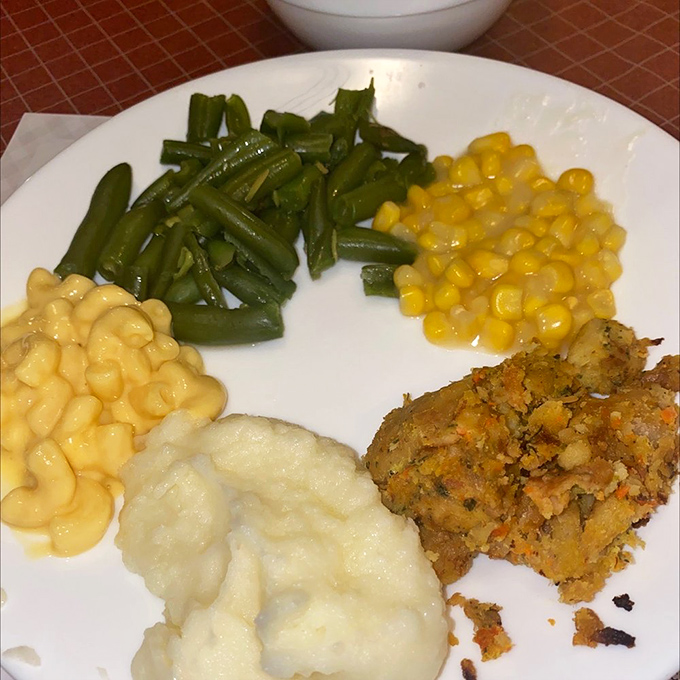 A plate that understands the four food groups of Midwestern cuisine: mashed potatoes, corn, green beans, and "something crispy."