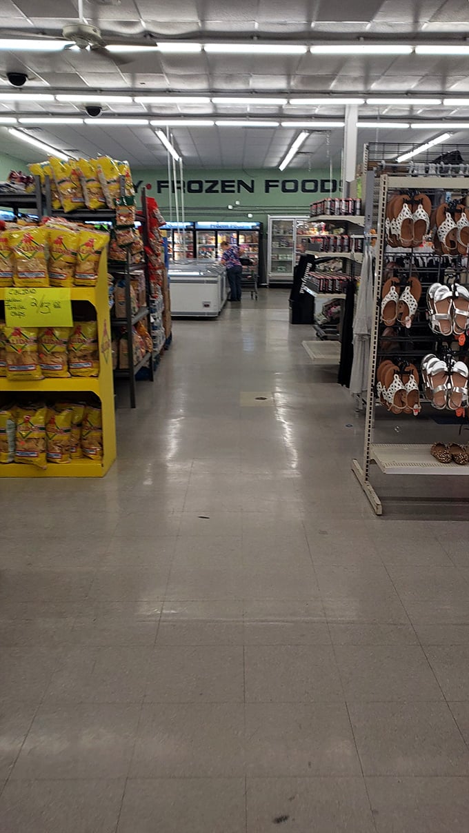 The frozen food section beckons with promises of convenience, while summer sandals stand ready for post-dinner strolls. Retail multitasking at its finest.