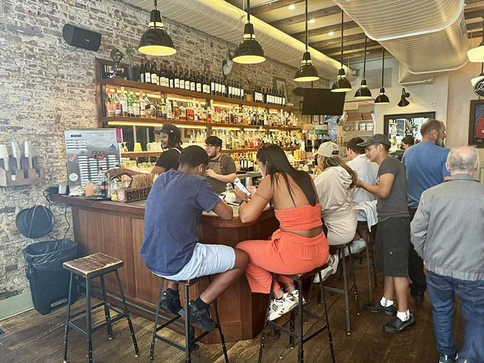 The bar buzzes with the energy of New Yorkers who understand that good drinks with good food is mathematics that always adds up.