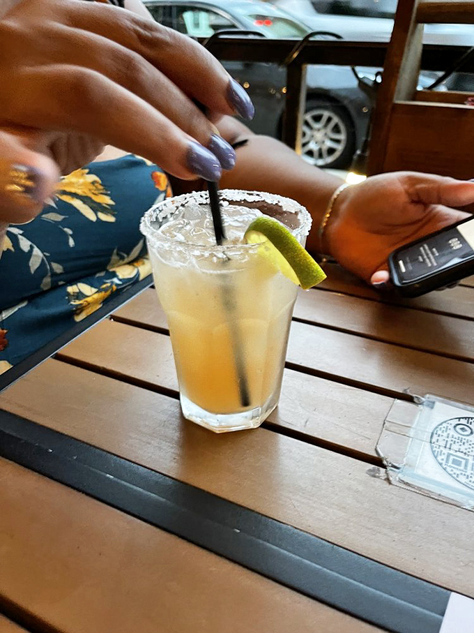 This refreshing cocktail with its salt rim is the perfect palate cleanser between bites of burger bliss. Hydration with benefits!