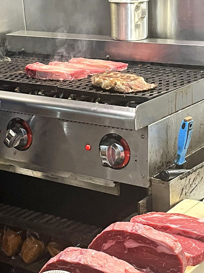 Where the magic happens&mdash;ribeyes meeting fire on the hearth of flavor. This grill has seen more perfect steaks than a cattle rancher.