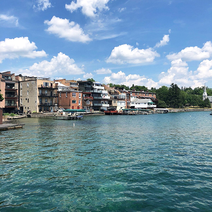 The waterfront buildings of Skaneateles create a postcard-perfect scene&mdash;proving that sometimes the best views of town are from the lake looking back.