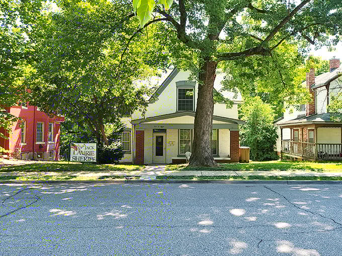 By day, the Sallie House blends into its charming neighborhood. The sign out front is the only hint of what awaits inside.