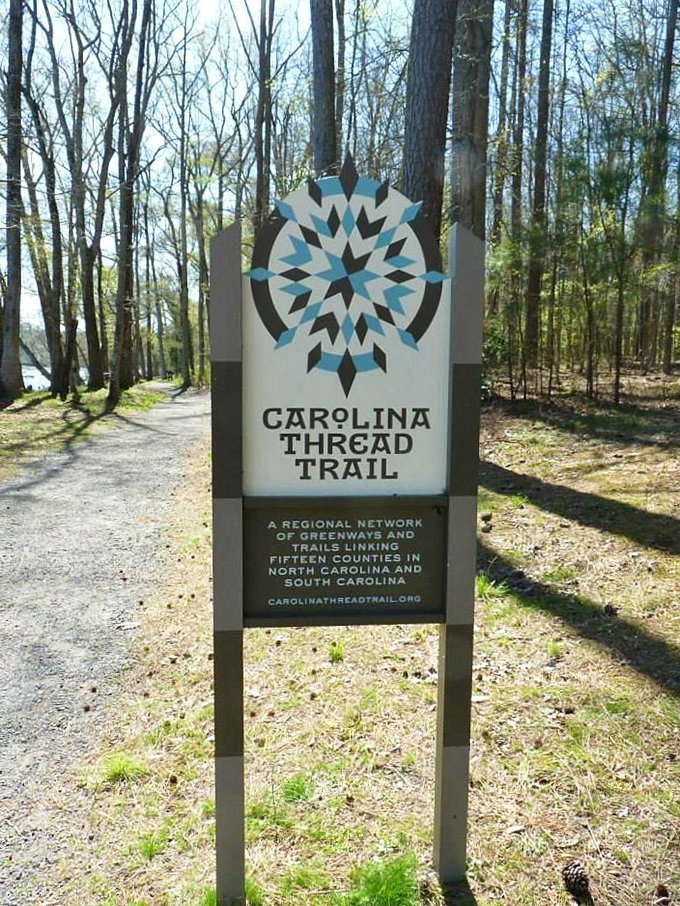 The Carolina Thread Trail sign marks one thread in a tapestry of pathways connecting fifteen counties&mdash;wanderlust made legitimate.