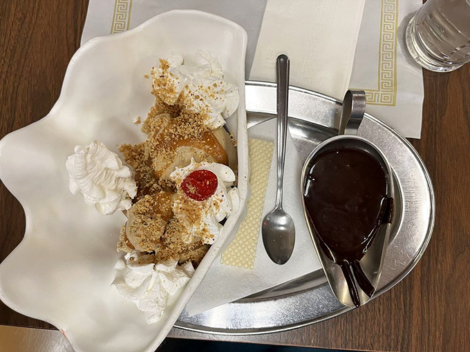 The legendary turtle sundae - where hot fudge, caramel, and pecans perform a three-act play with a coffee ice cream leading role.