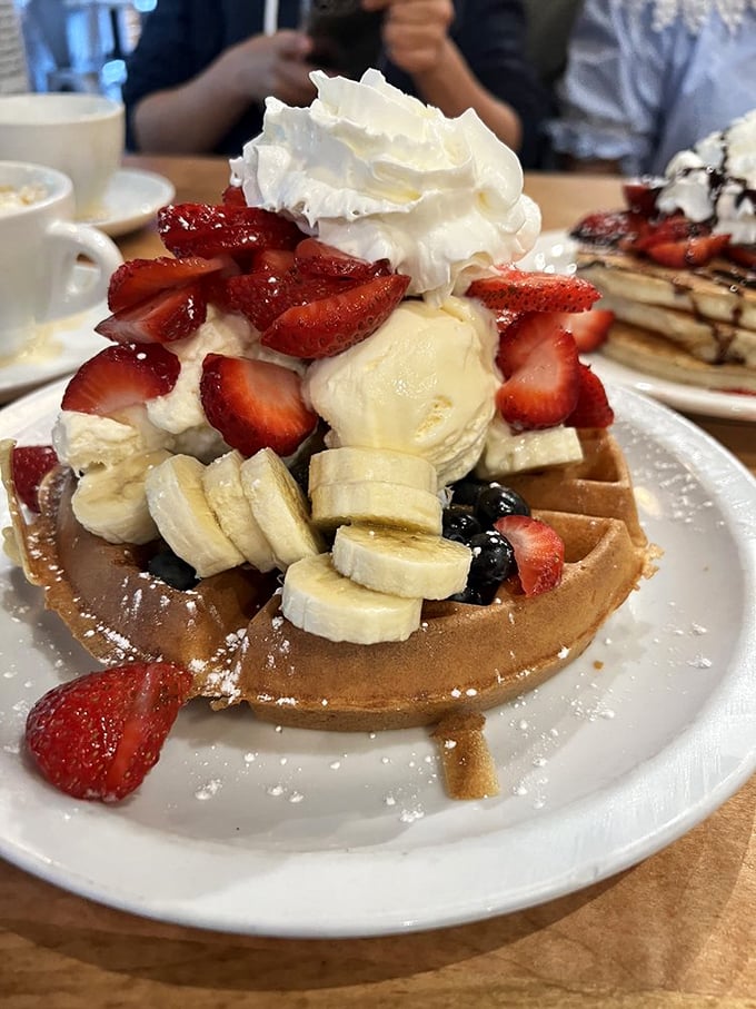 Fresh fruit and ice cream transform this waffle into summer on a plate. The whipped cream cloud on top is the breakfast equivalent of putting a cherry on a sundae.