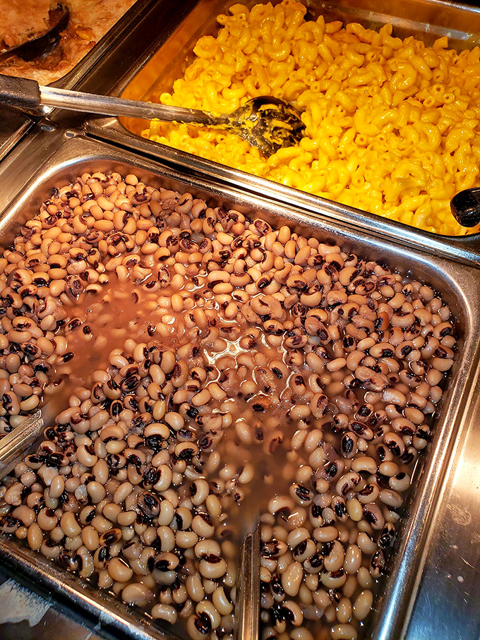Mac and cheese and black-eyed peas sharing a buffet tray&mdash;a delicious reminder that the best Southern cooking is both simple and profound.